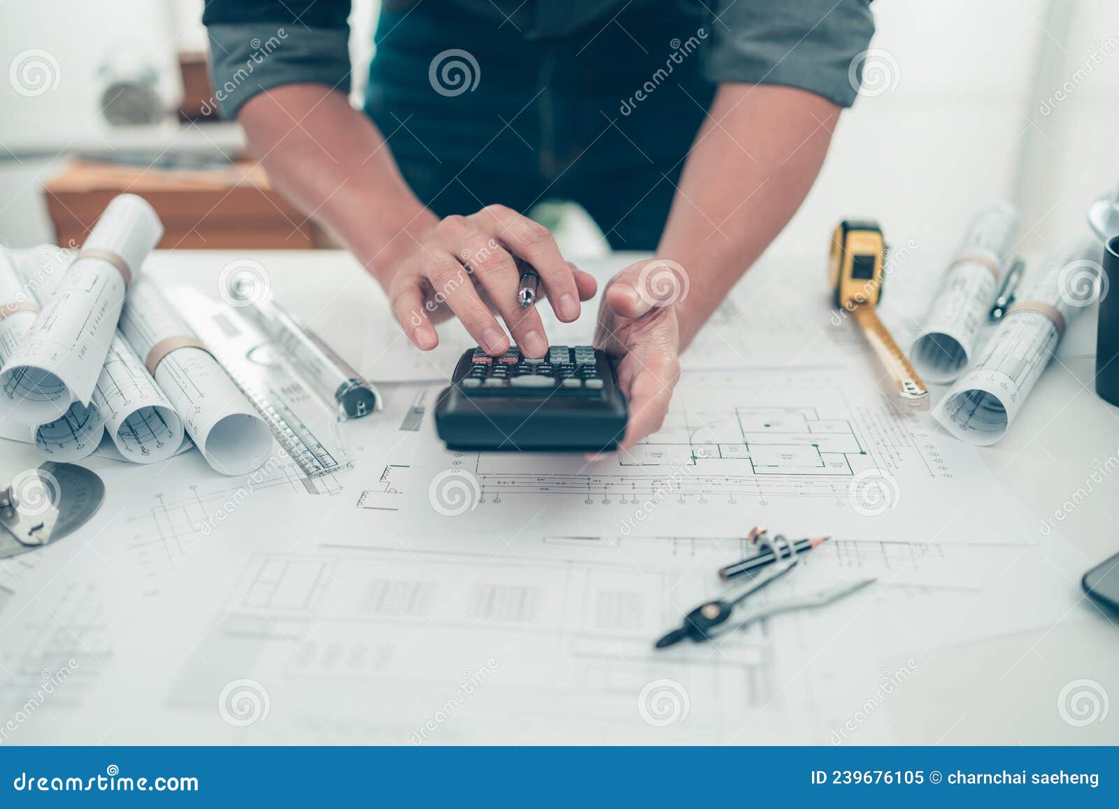 Architect Engineer Use Calculator for Calculate Drawing Design Working ...