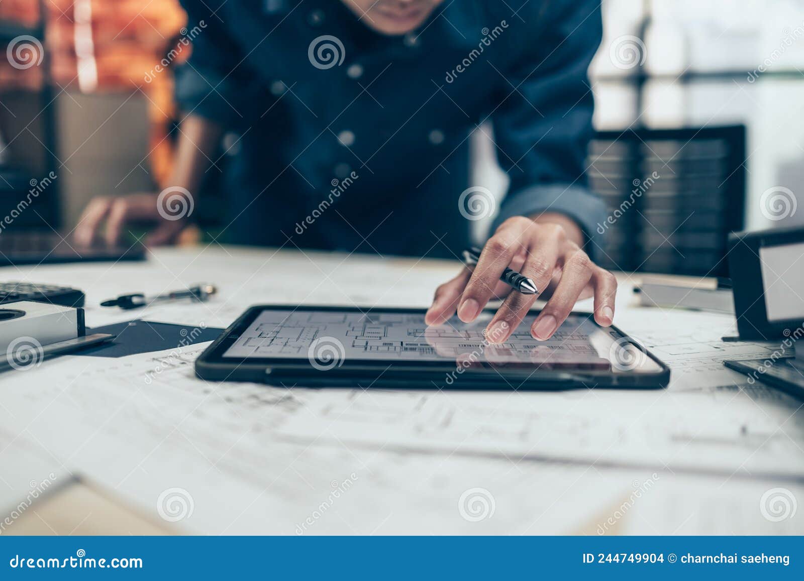 Architect Engineer Use Tablet To Read Drawing Design. House Planning ...