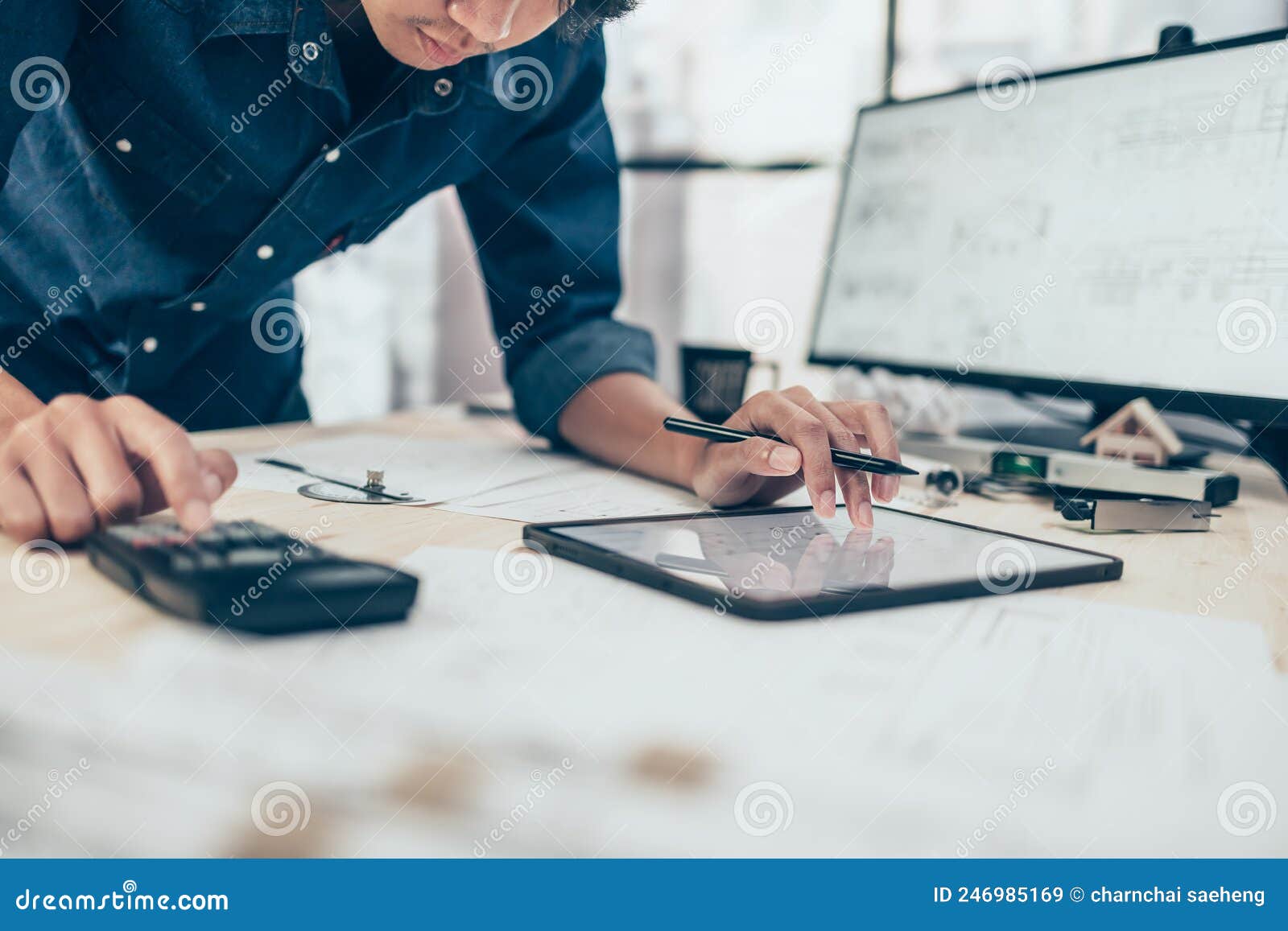 Architect Engineer Use Tablet To Read Drawing Design. House Planning ...