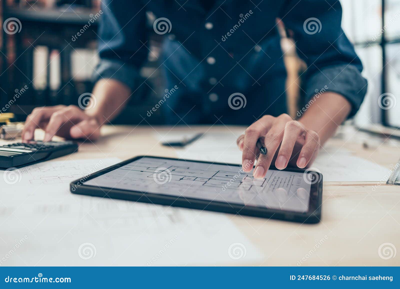 Architect Engineer Use Tablet To Read Drawing Design. House Planning ...