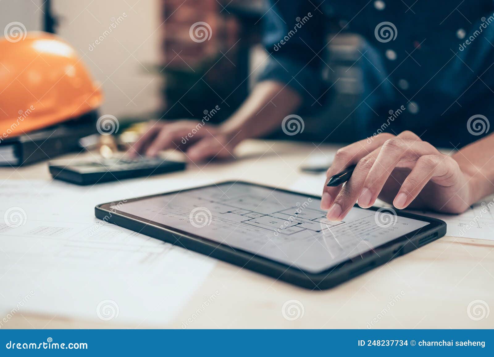 Architect Engineer Use Tablet To Read Drawing Design. House Planning ...