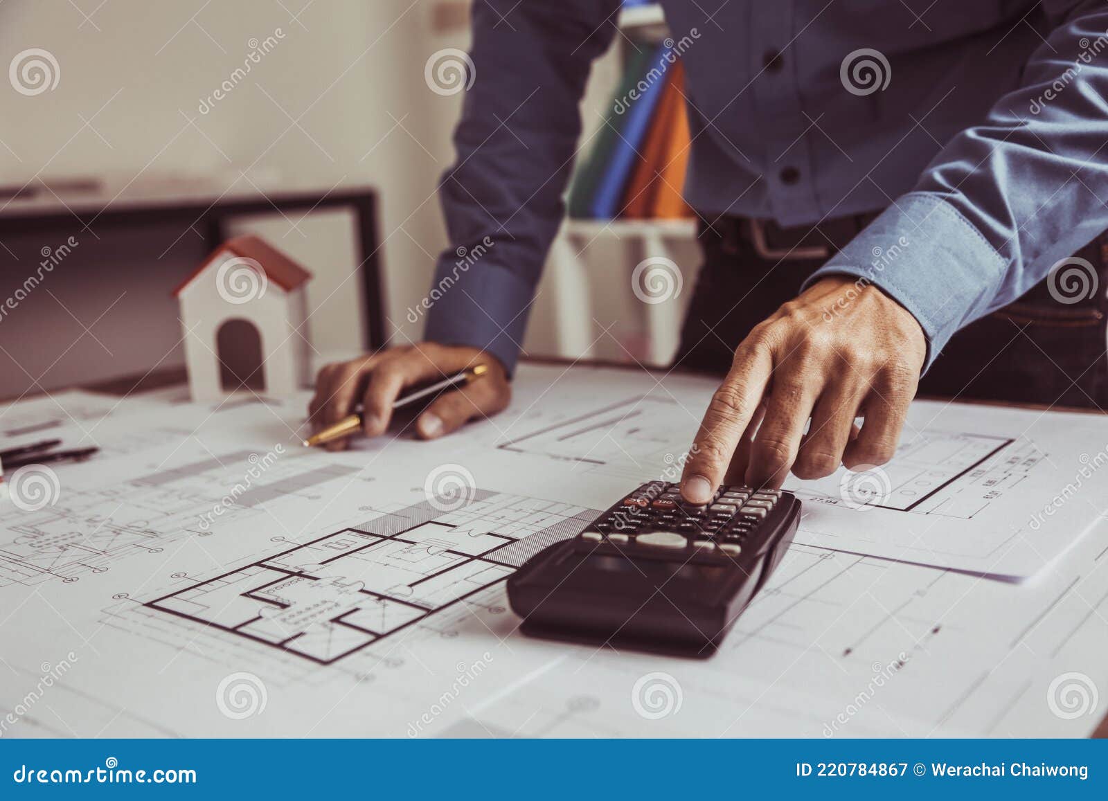 Architect Engineer Using Calculator Estimate Construction Drawings with ...