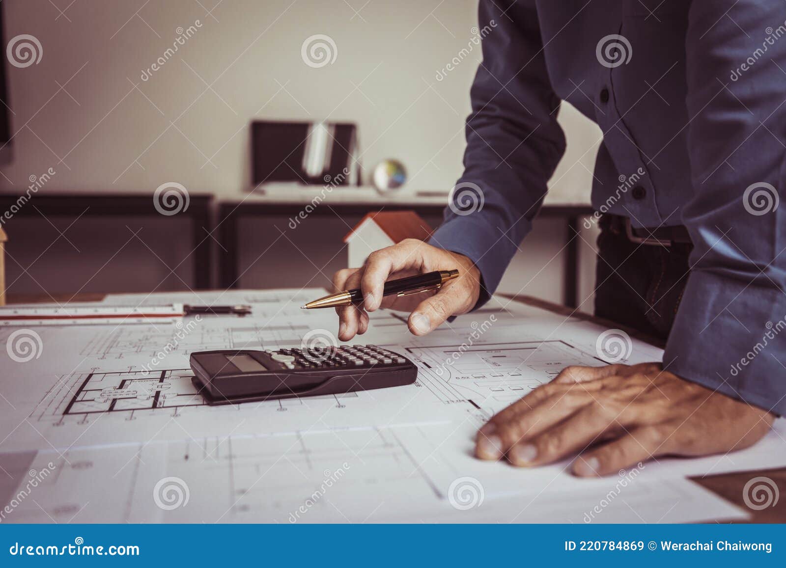 Architect Engineer Using Calculator Estimate Construction Drawings with ...