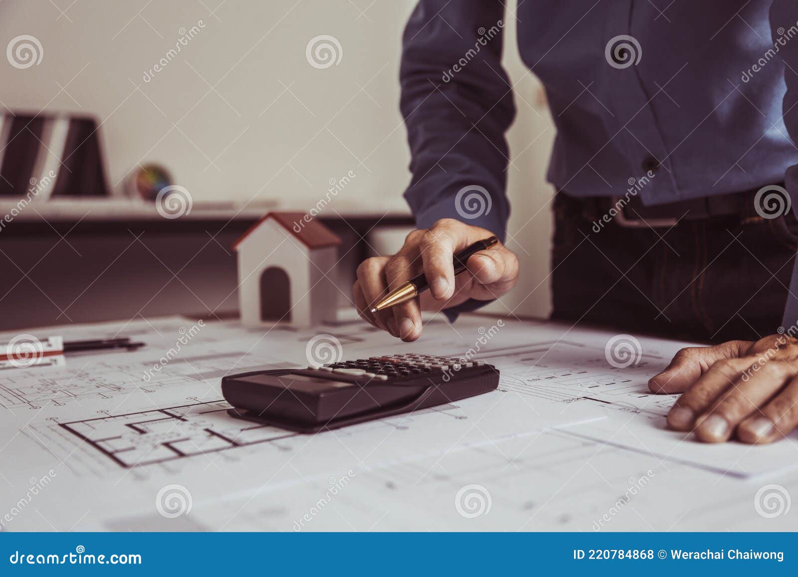 Architect Engineer Using Calculator Estimate Construction Drawings with ...