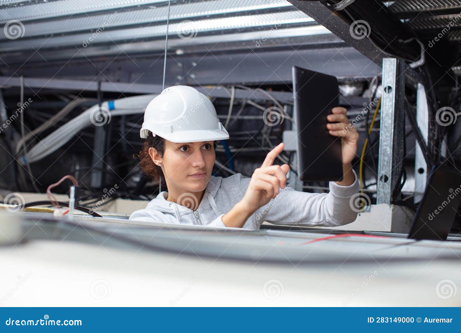 Architect Engineer Woman in Hard Hat Checking Construction Site Ceiling ...