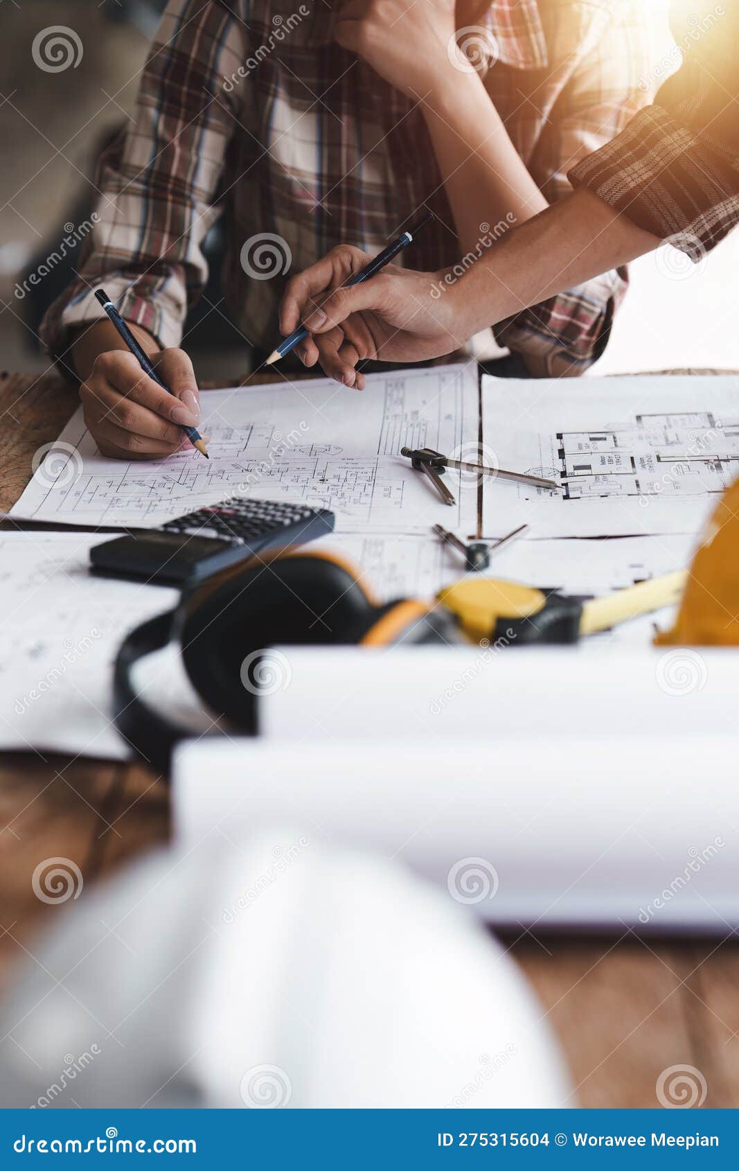 Architect and Engineer Working with Blueprints for Architectural Plan ...