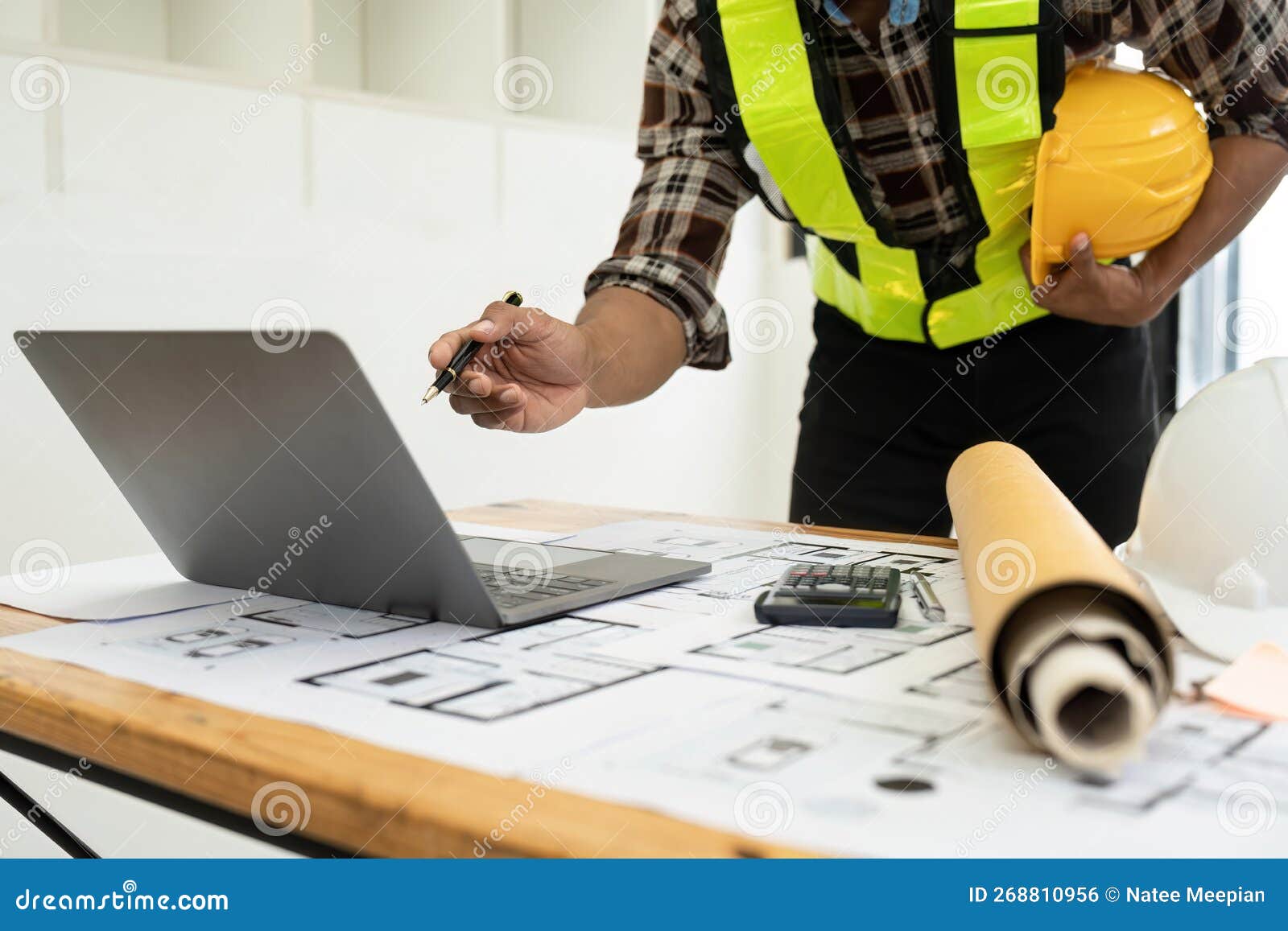 Architect or Engineer Working with Blueprints for Architectural Plan ...