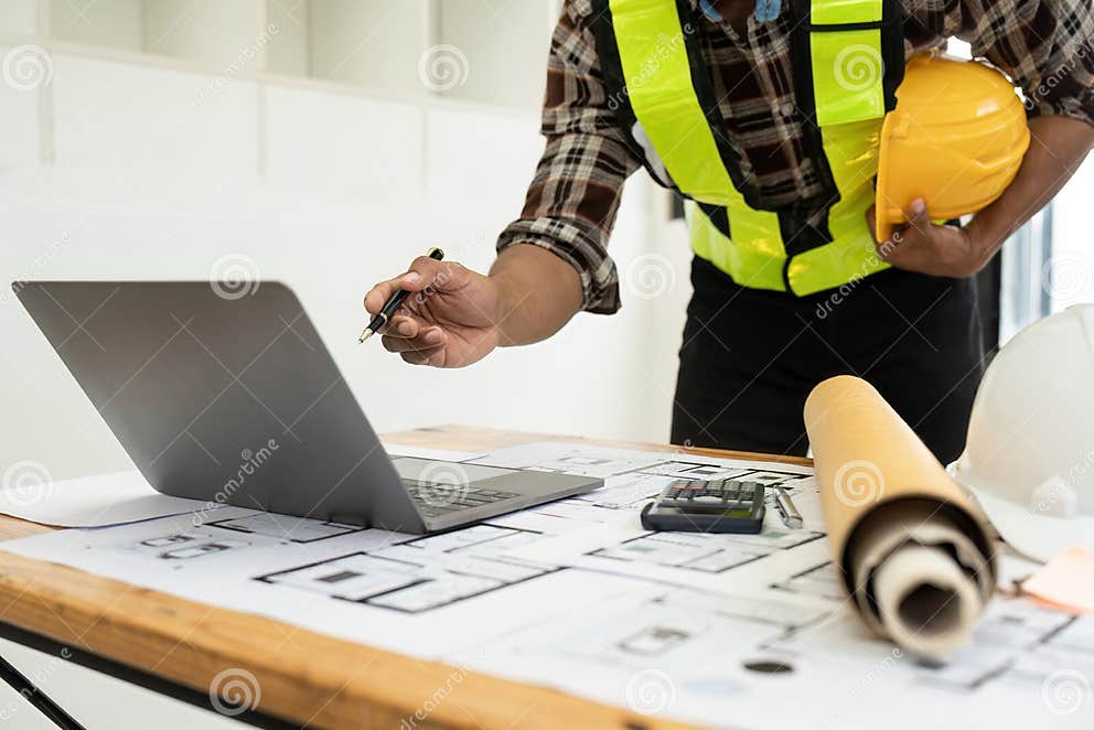 Architect or Engineer Working with Blueprints for Architectural Plan ...