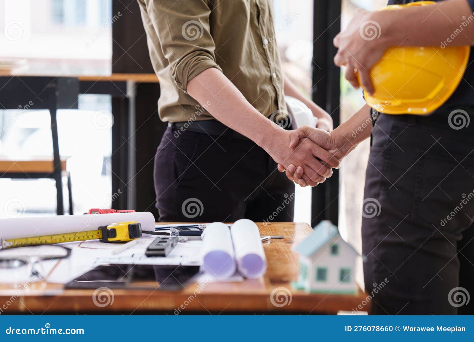 Architect and Engineer Working with Blueprints for Architectural Plan ...