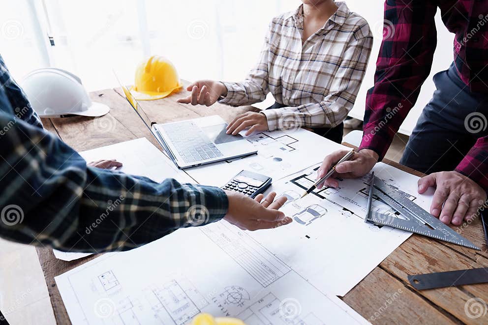 Architect and Engineer Working with Blueprints for Architectural Plan ...