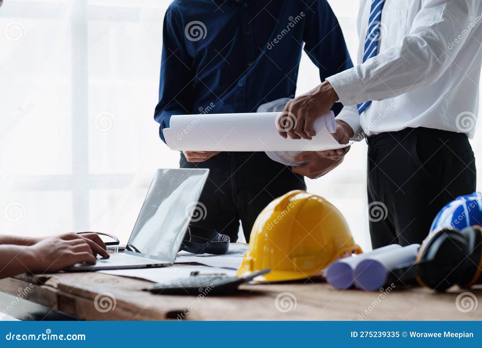 Architect and Engineer Working with Blueprints for Architectural Plan ...