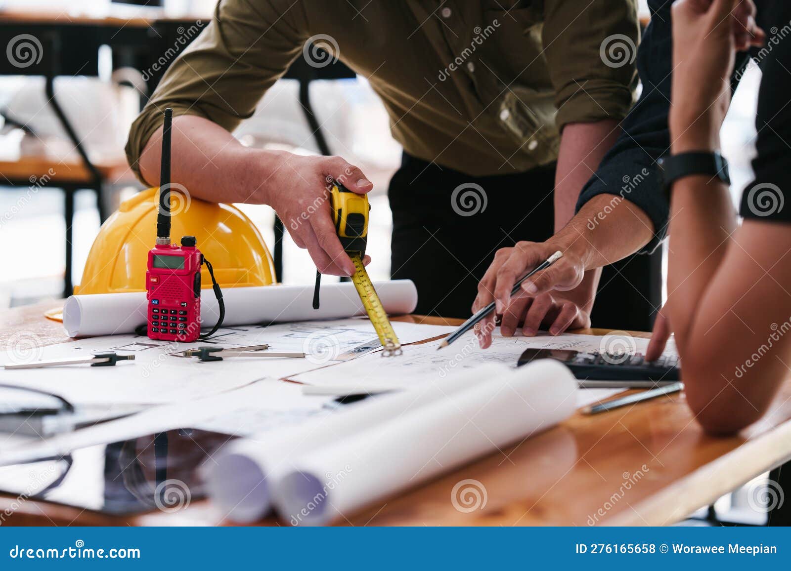 Architect and Engineer Working with Blueprints for Architectural Plan ...