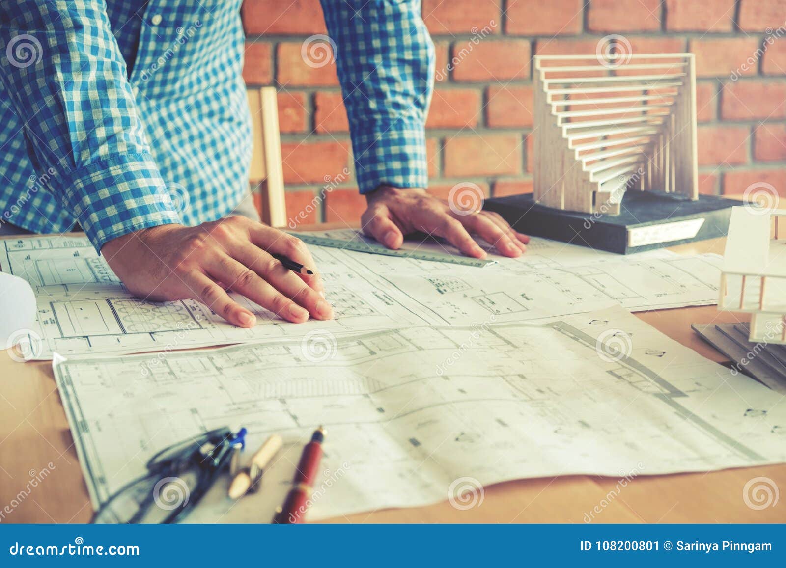 Architect or Engineer Working in Office on Blueprint. Architects Stock ...