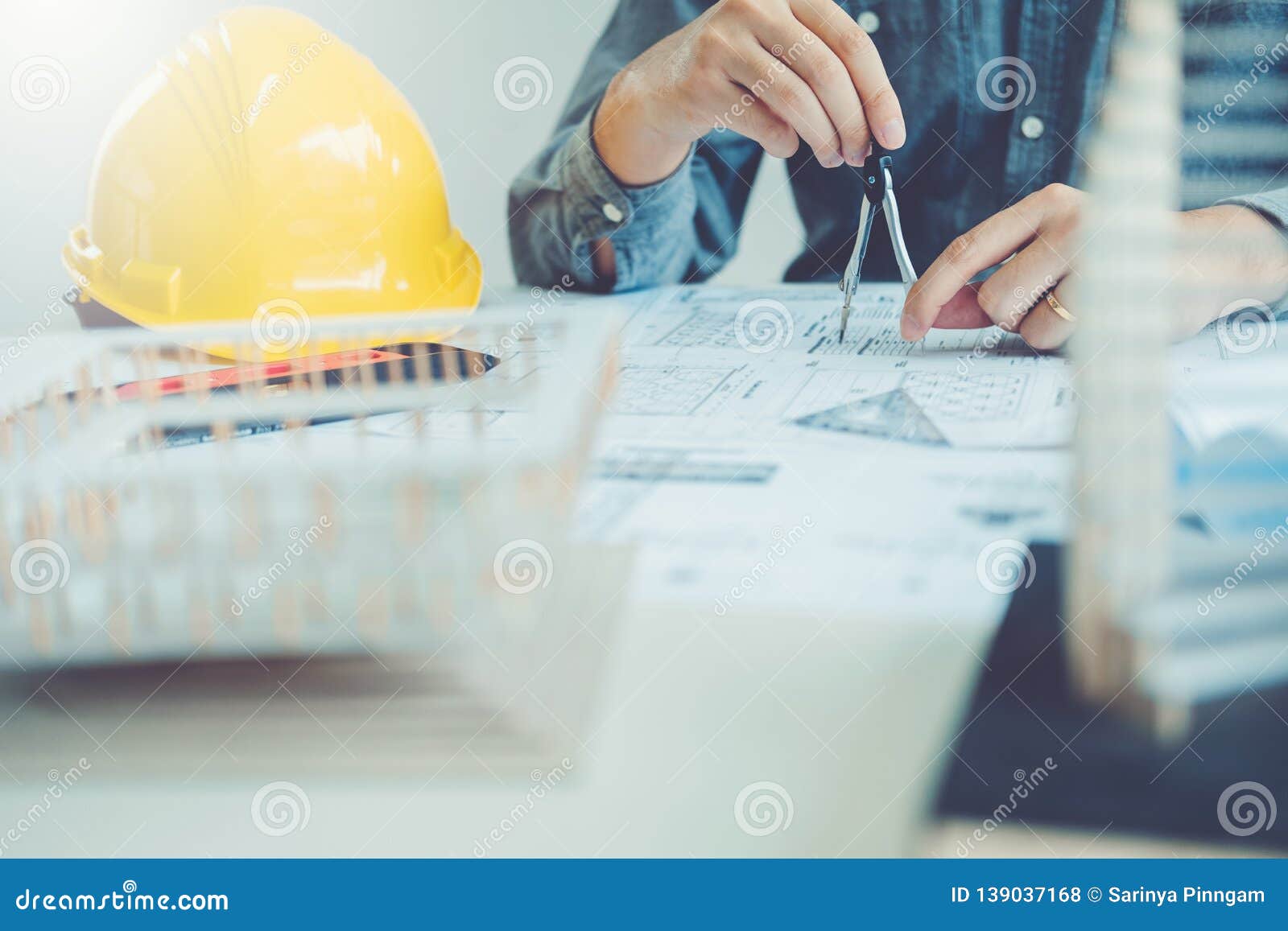Architect or Engineer Working in Office on Blueprint. Architects ...