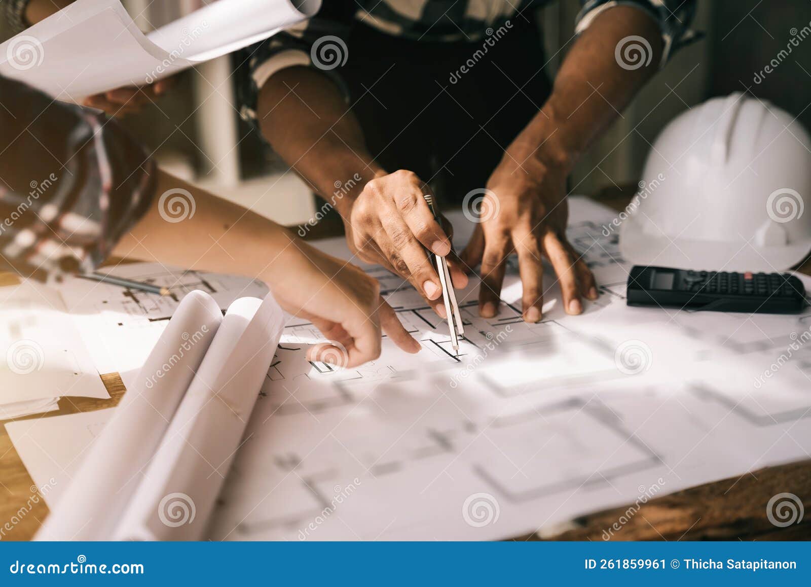 Architect or Engineer Working on Table Use Drawing Tool on the Paper ...