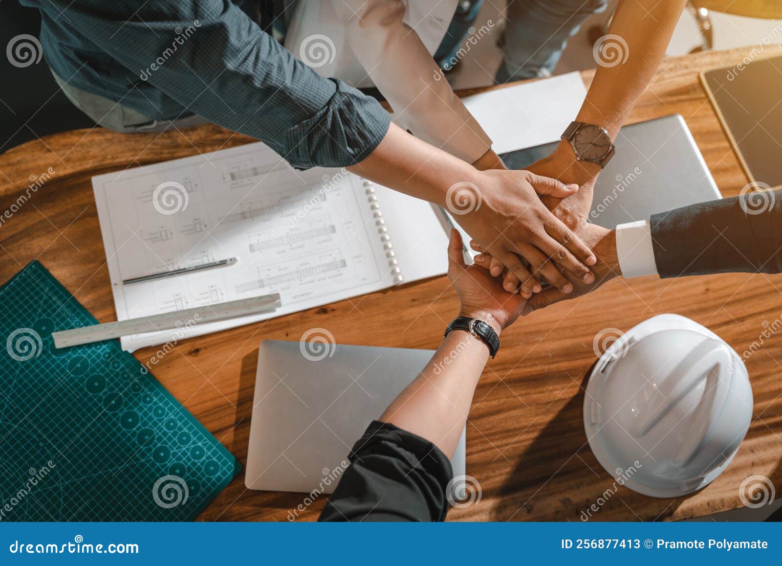 Architect with Engineers are Helping To Design Work on Blueprints and ...