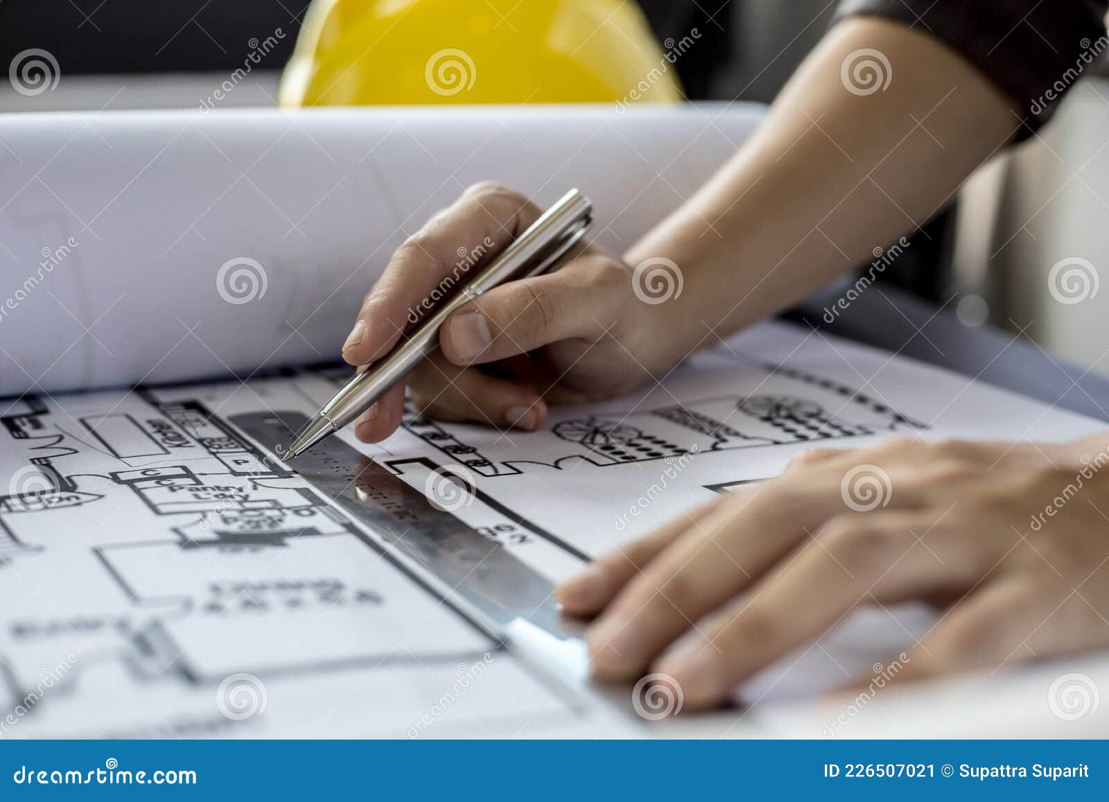 Architect Engineers Are Writing House Plans In Order To Modify Some Of ...
