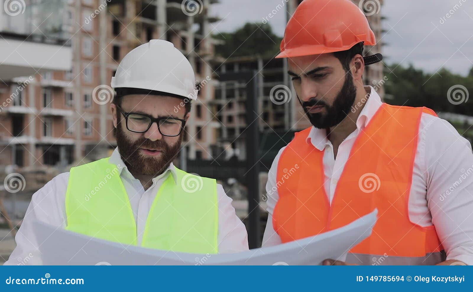 Architect Expert Engineers Talking and Analyze Design Plan Standing ...