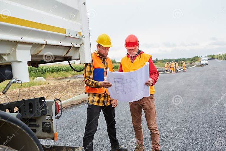 Architect and Foreman with Construction Plan or Site Plan Stock Image ...