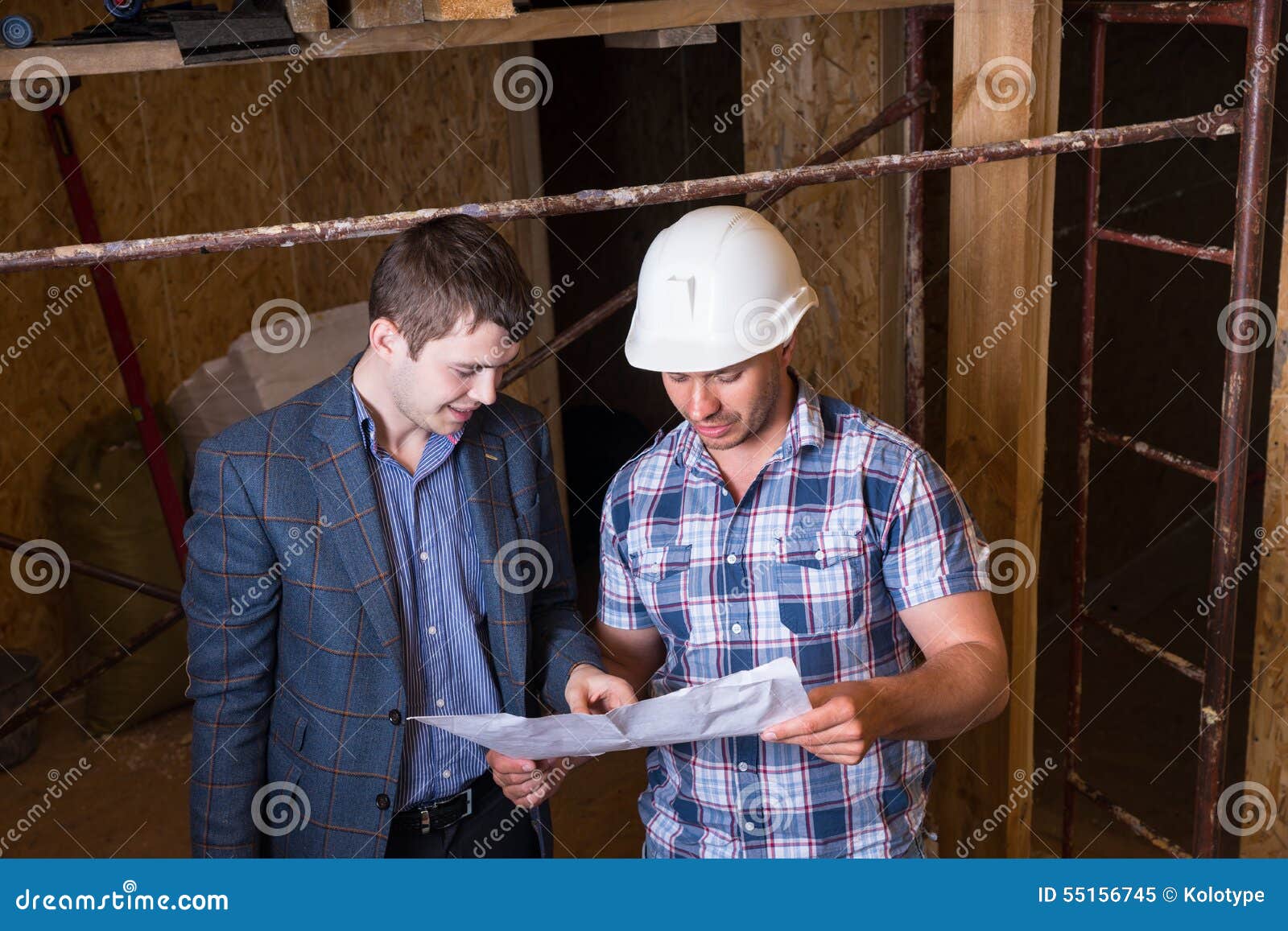 Architect and Foreman Inspecting Building Plans Stock Image - Image of ...
