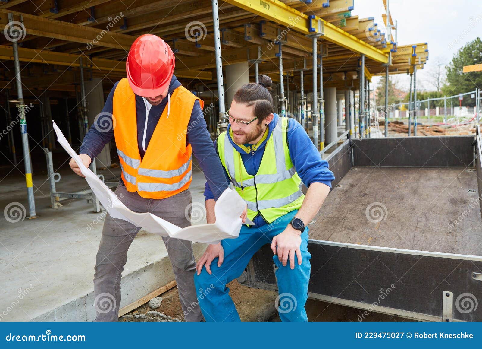 Architect and Foreman Look at Construction Drawing Stock Image - Image ...