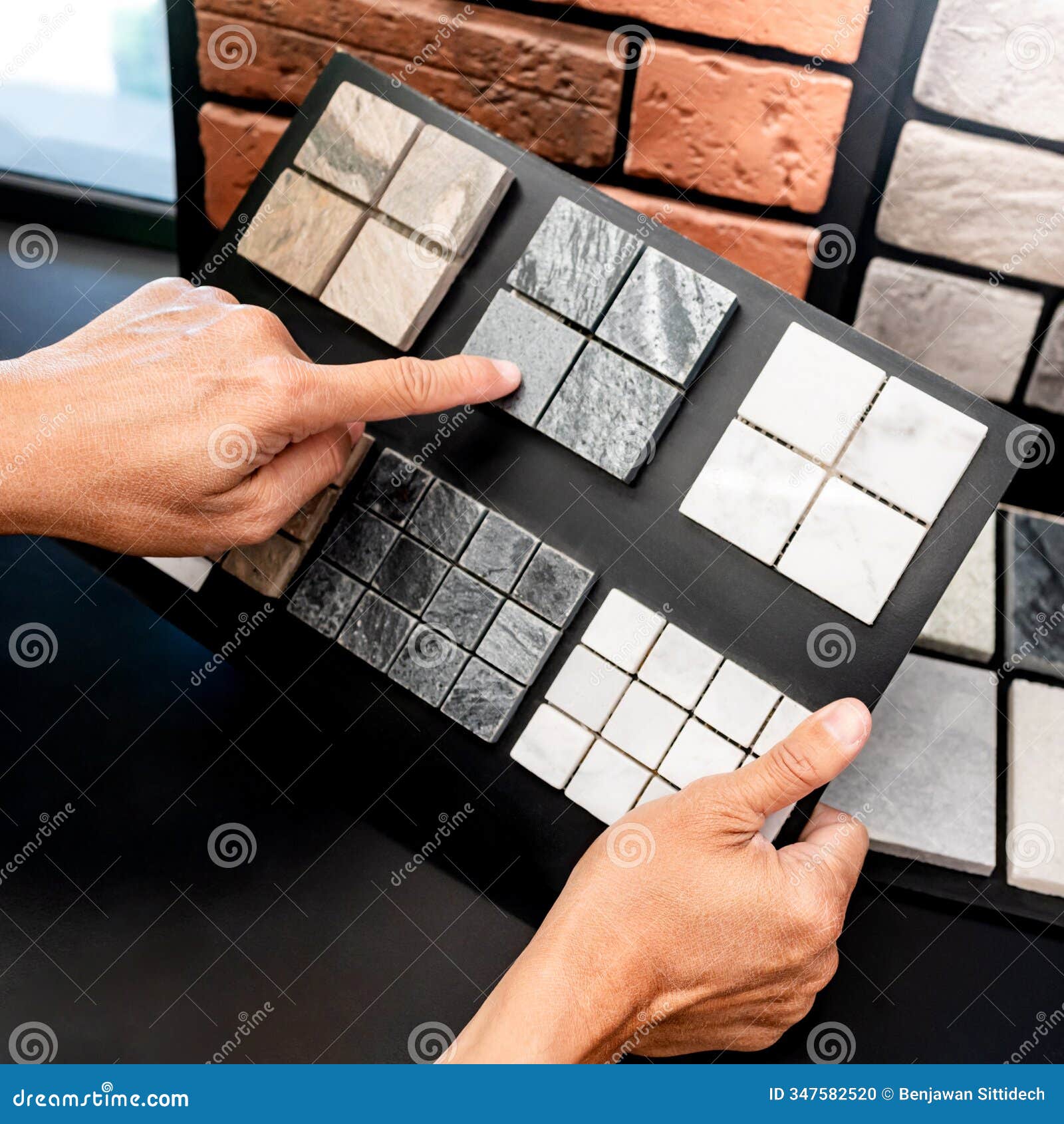 Architect Hand Pointing at Stone Tile Collection Display on Sample ...