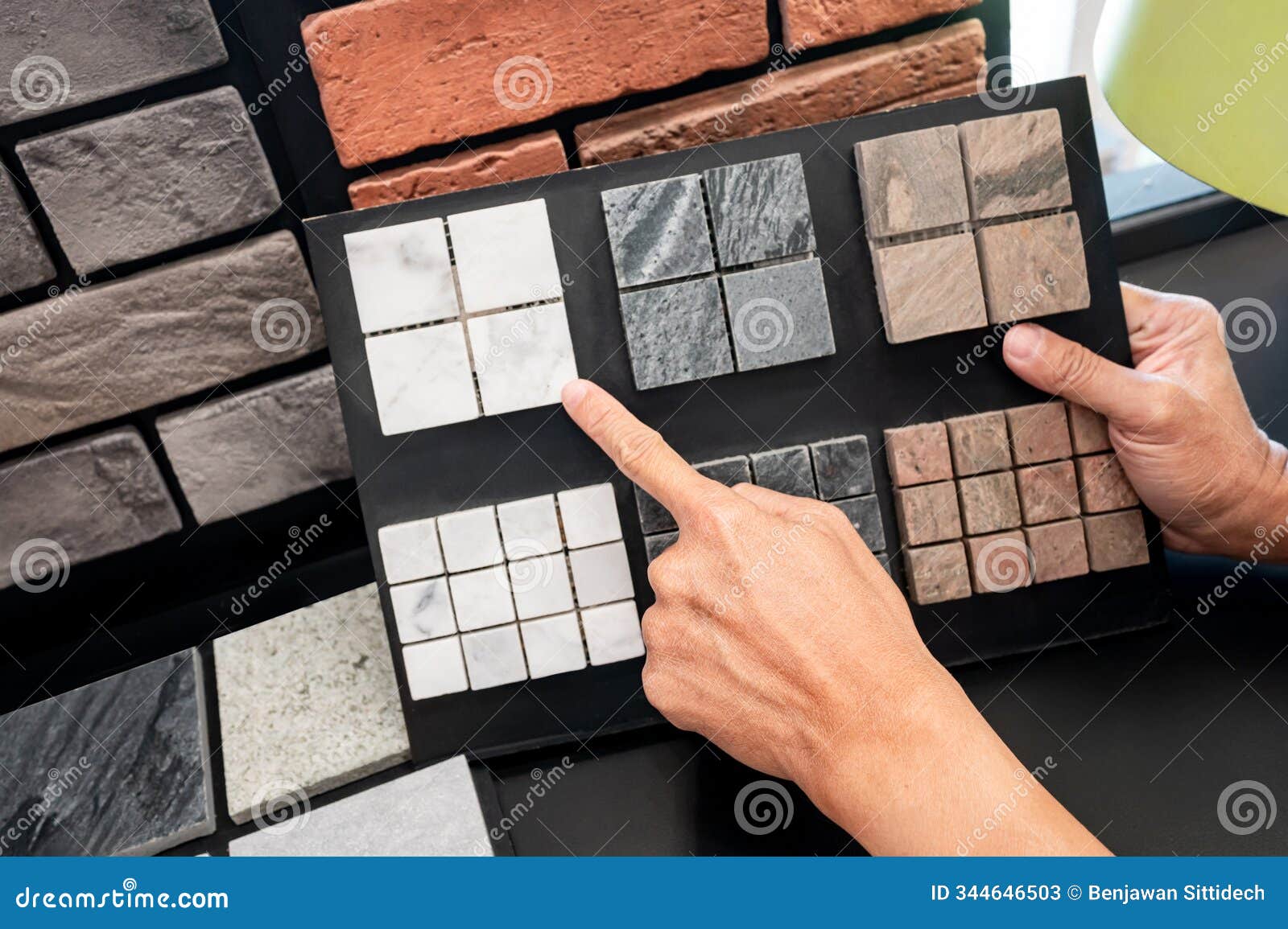 Architect Hand Pointing at Stone Tile Collection Display on Sample ...