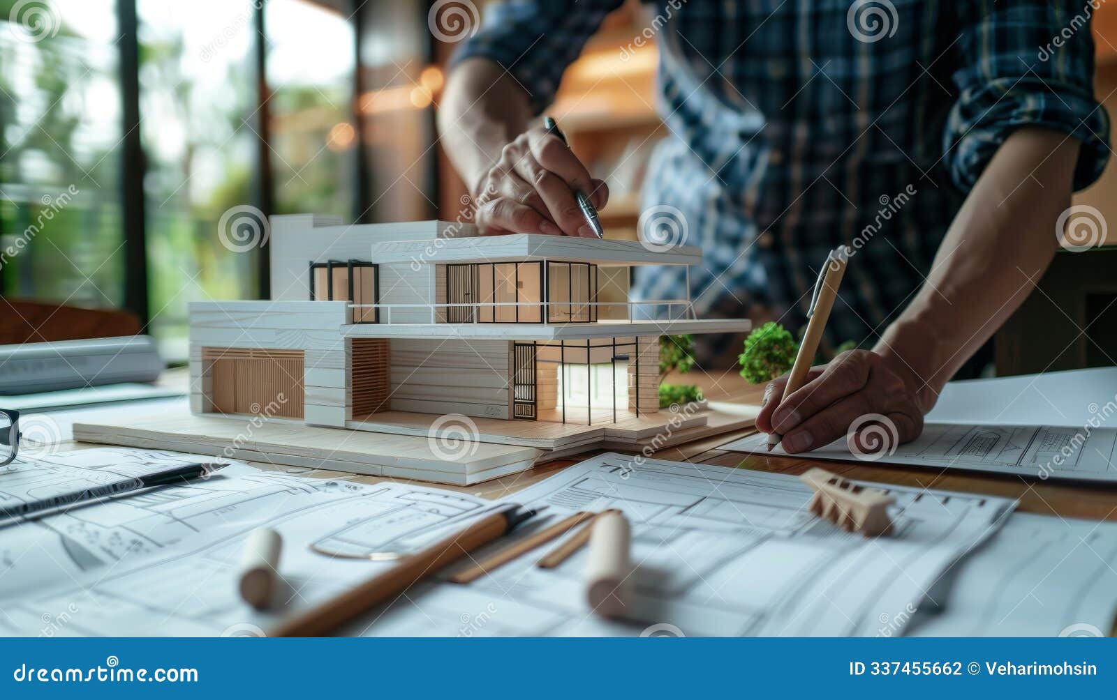 Architect Hands Write Building Plan with Model House or Building on ...