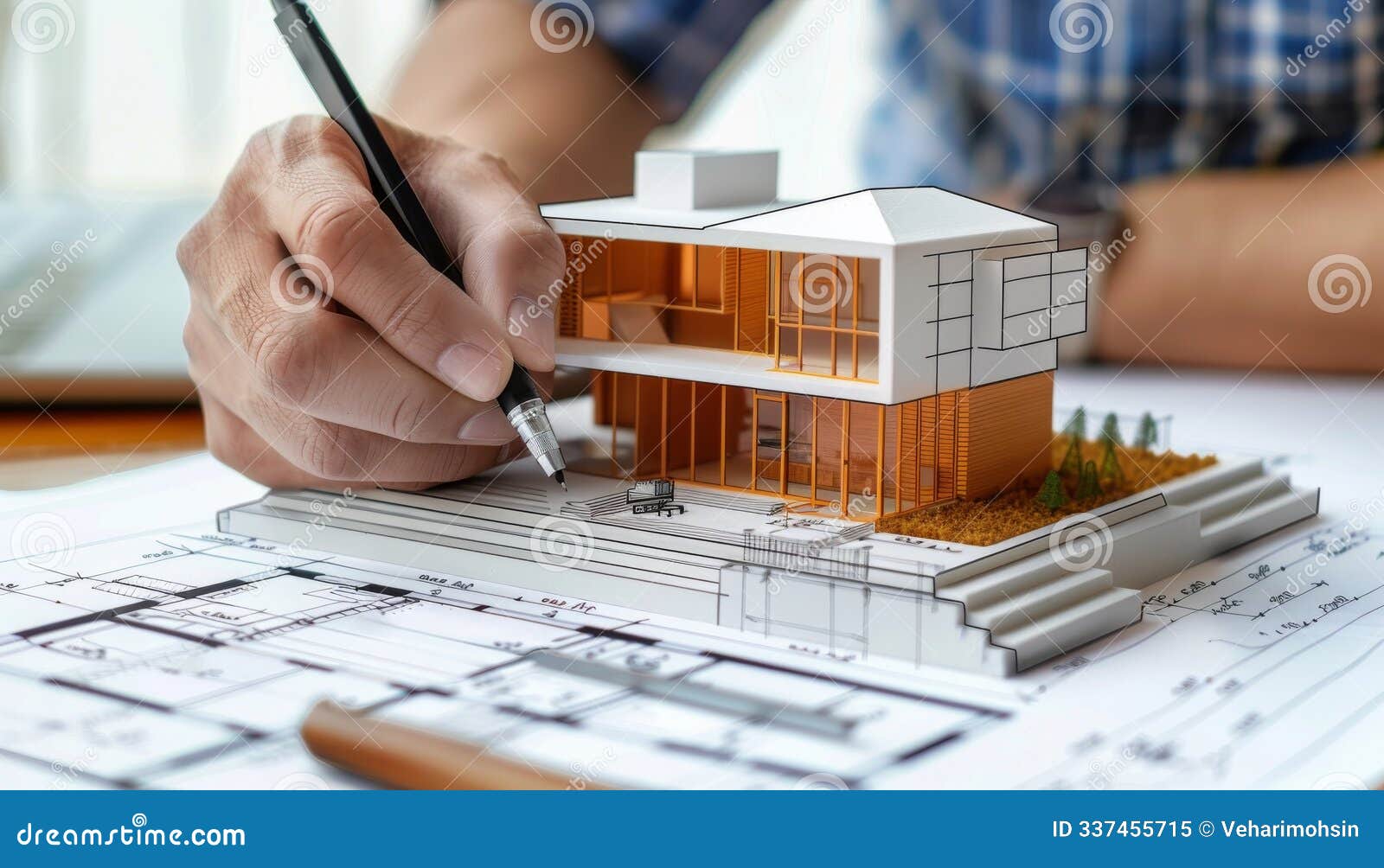 Architect Hands Write Building Plan with Model House or Building on ...