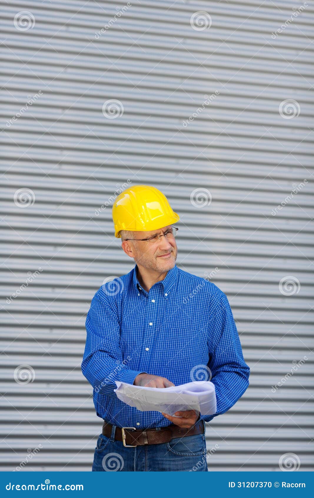 Architect Holding Blueprint while Looking Away Stock Photo - Image of ...
