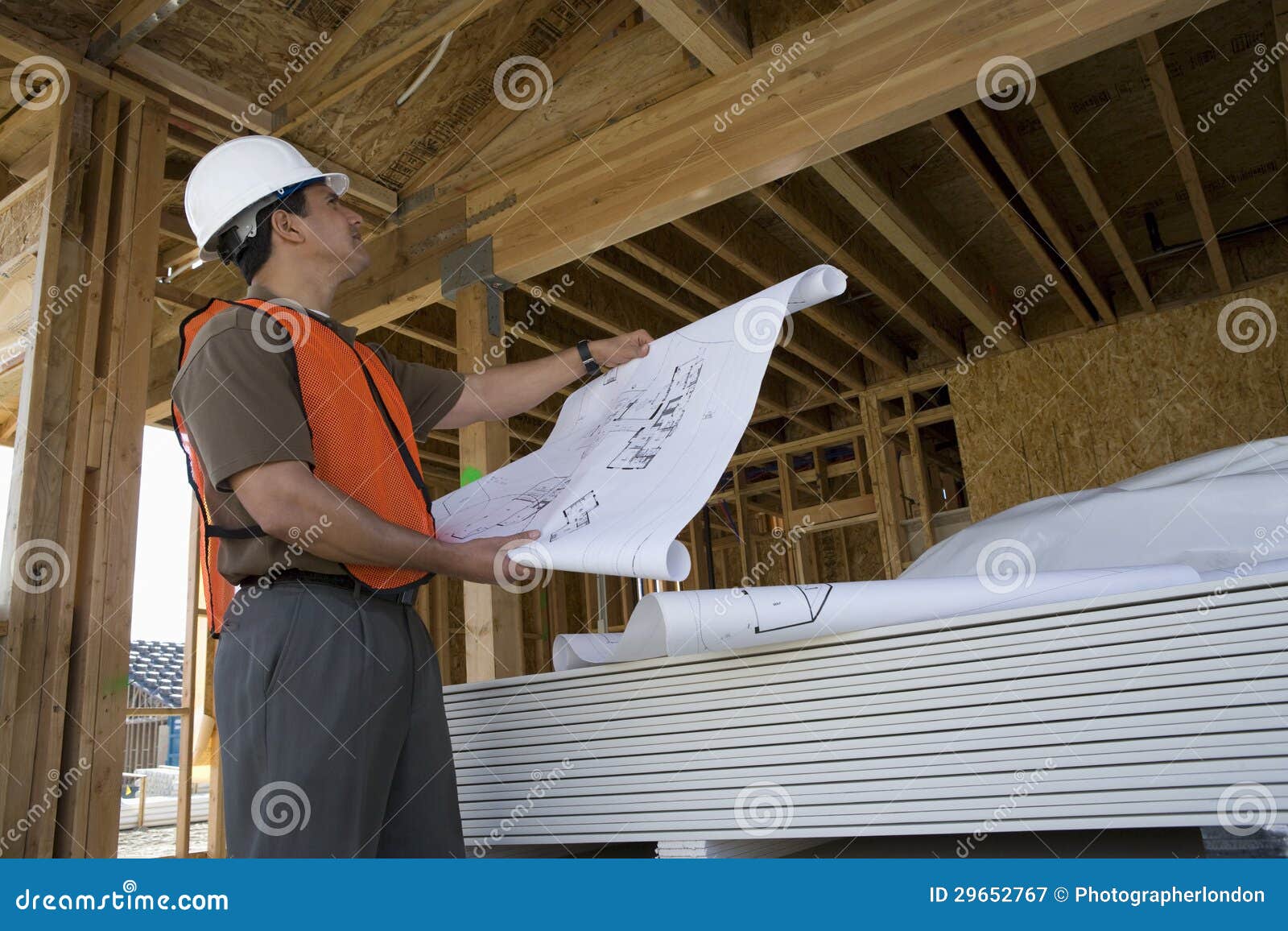 Architect Inspecting at Construction Site Stock Image - Image of mature ...