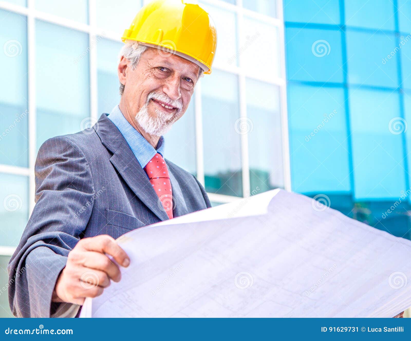 Architect Looking at Blueprint Stock Image - Image of construction ...