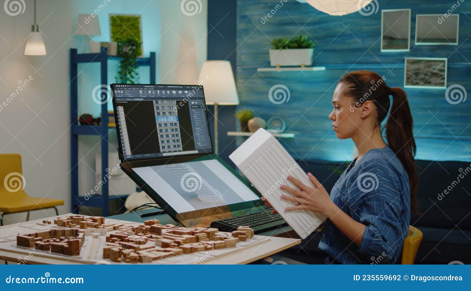 Architect Looking at Computer with Building Model Stock Photo - Image ...