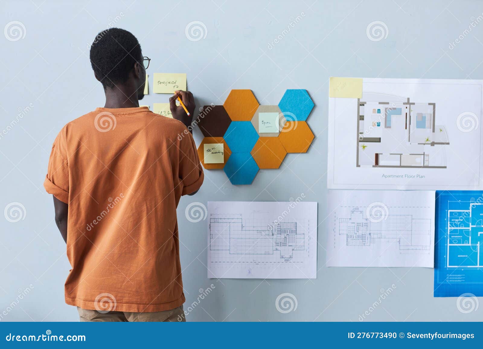 Architect Making Notes on the Wall in Office Stock Photo - Image of ...