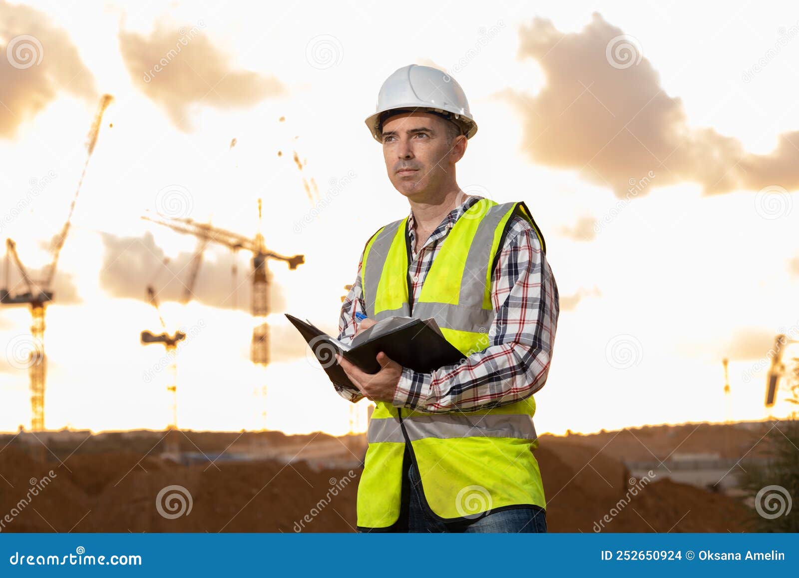 Architect Man Holding a Project Book Plan Stock Photo - Image of ...