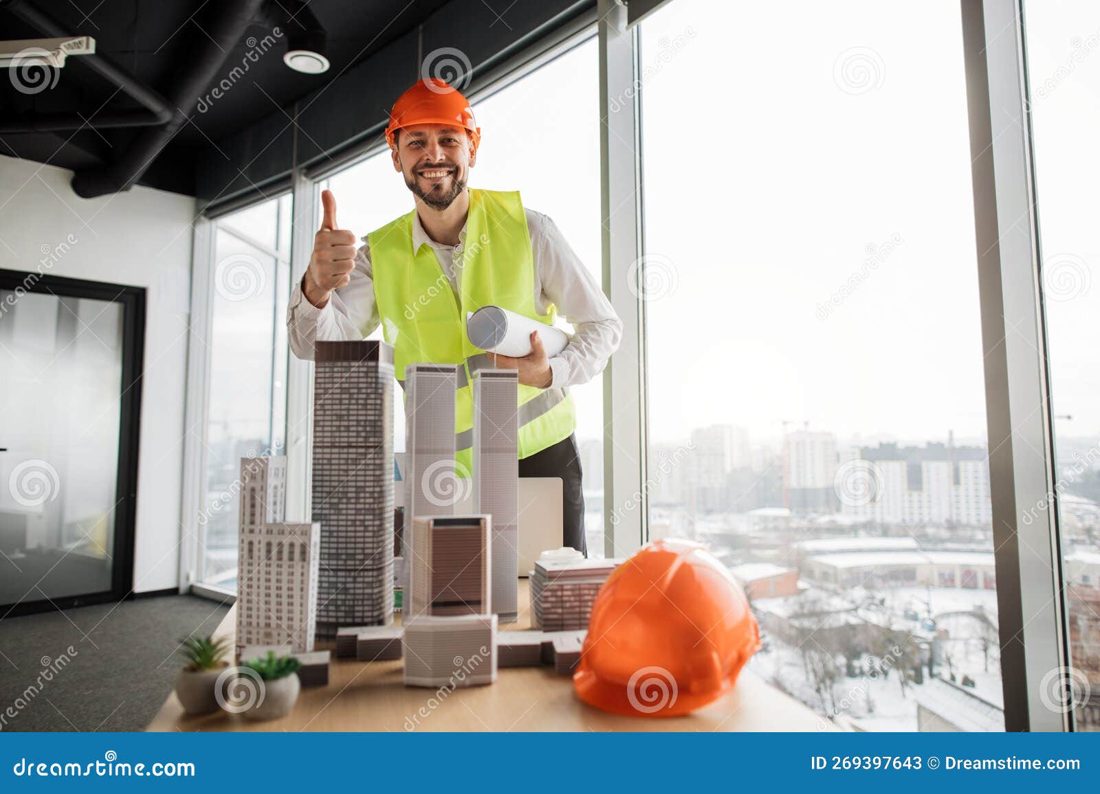 Architect Man or Male Builder Adding Component To a Building Model ...