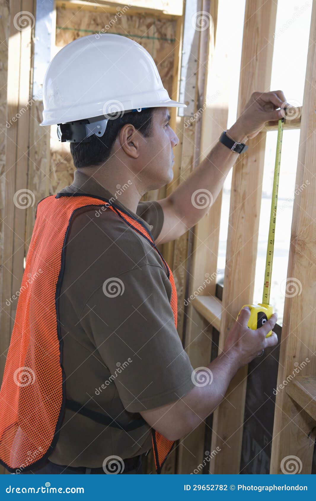 Architect Measuring Wall With Flexible Ruler Stock Photo ...