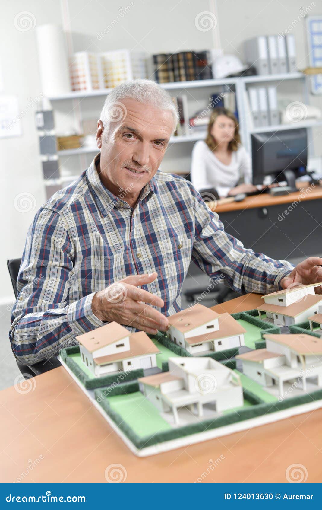 Architect with model house stock photo. Image of cottage - 124013630