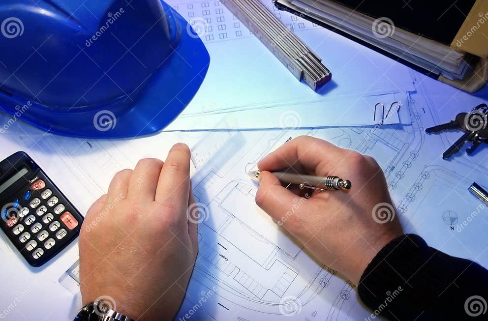 Architect with a plan stock photo. Image of male, layout - 1401652