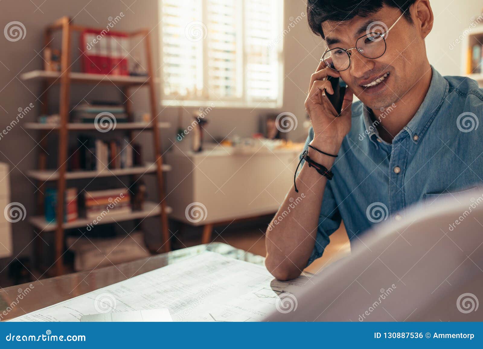 Architect with Plan Answering Phone Call Stock Photo - Image of office ...