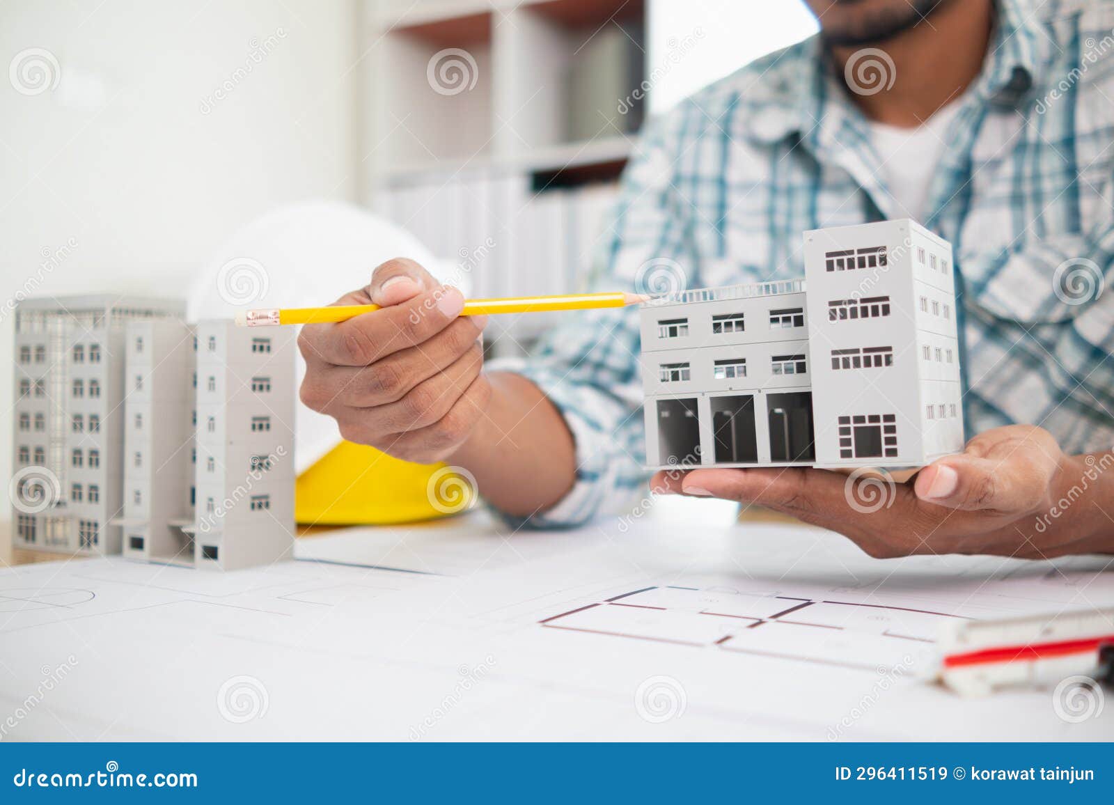 Architect is Preparing House Model and Construction Plans on Blueprints ...