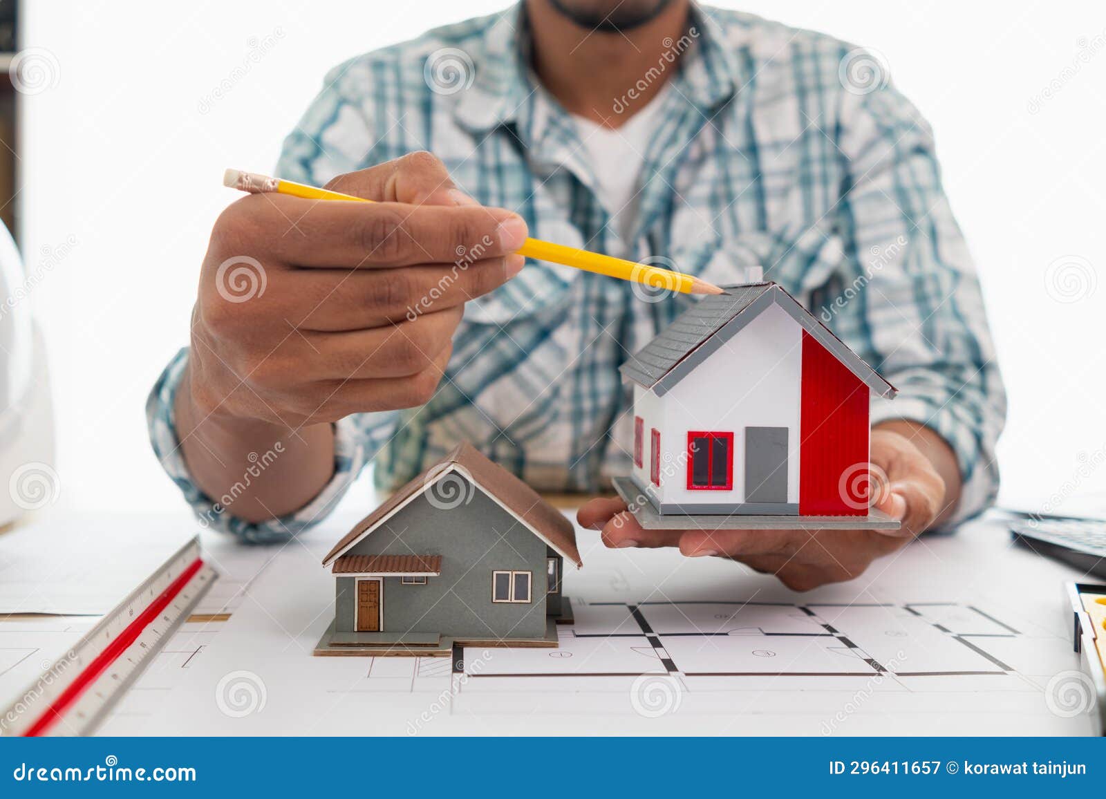 Architect is Preparing House Model and Construction Plans on Blueprints ...