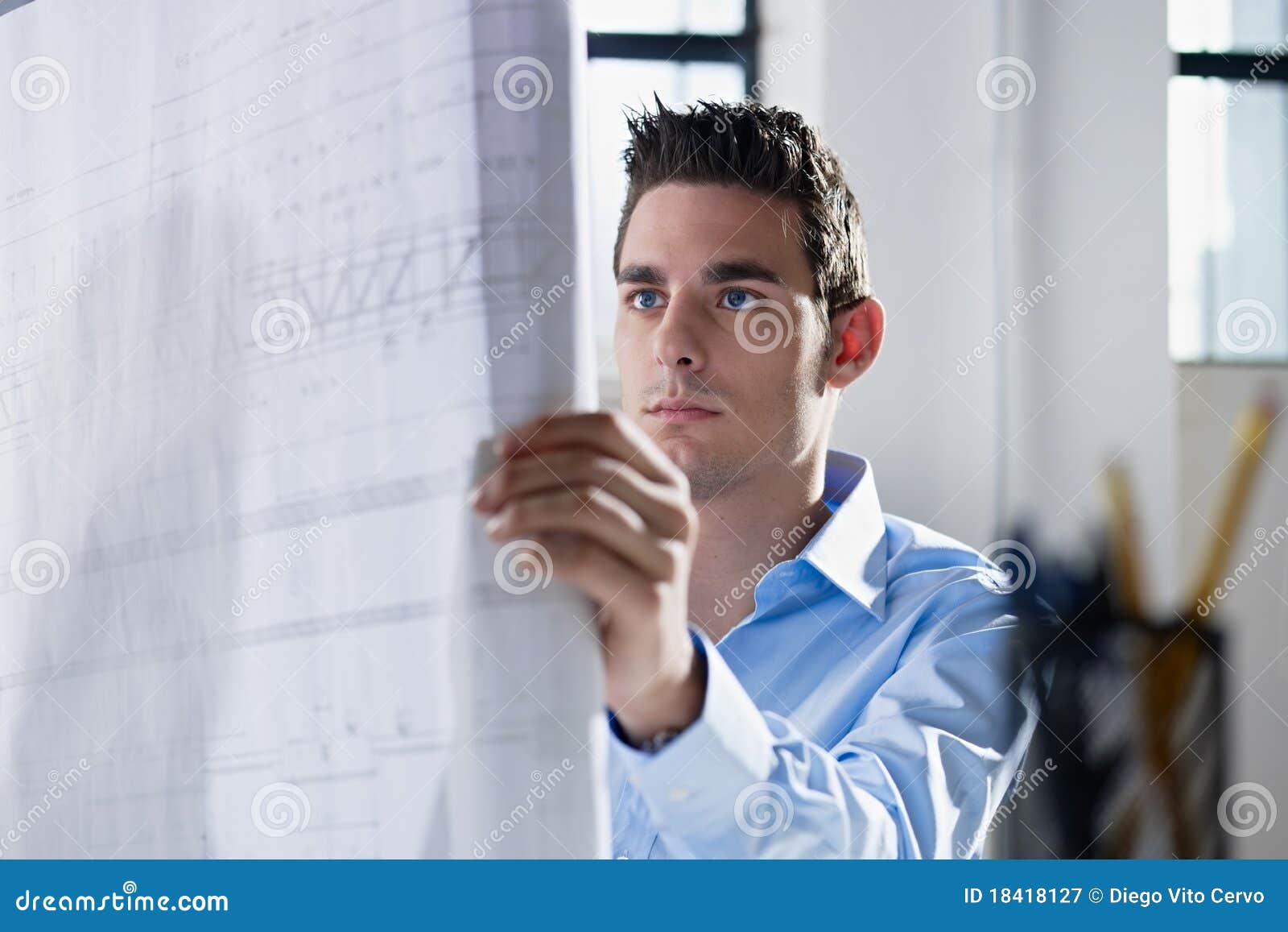 Architect Reading Blueprint in Office Stock Image - Image of ...