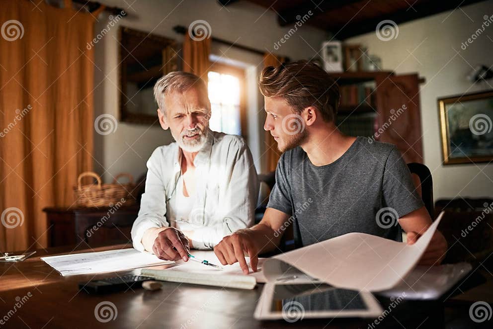 Architect, Senior Man and Apprentice with Documents Discussion for ...