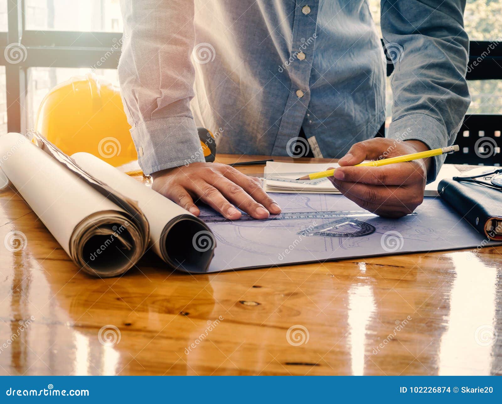 Architect Sketching A Construction Project Blueprint Stock Photography ...