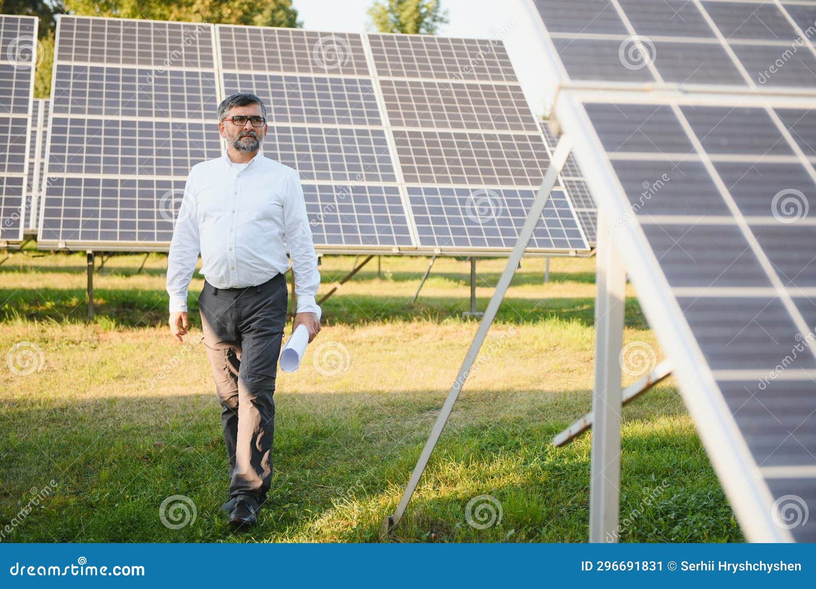 Architect Standing by Solar Panels. Stock Image - Image of computer ...