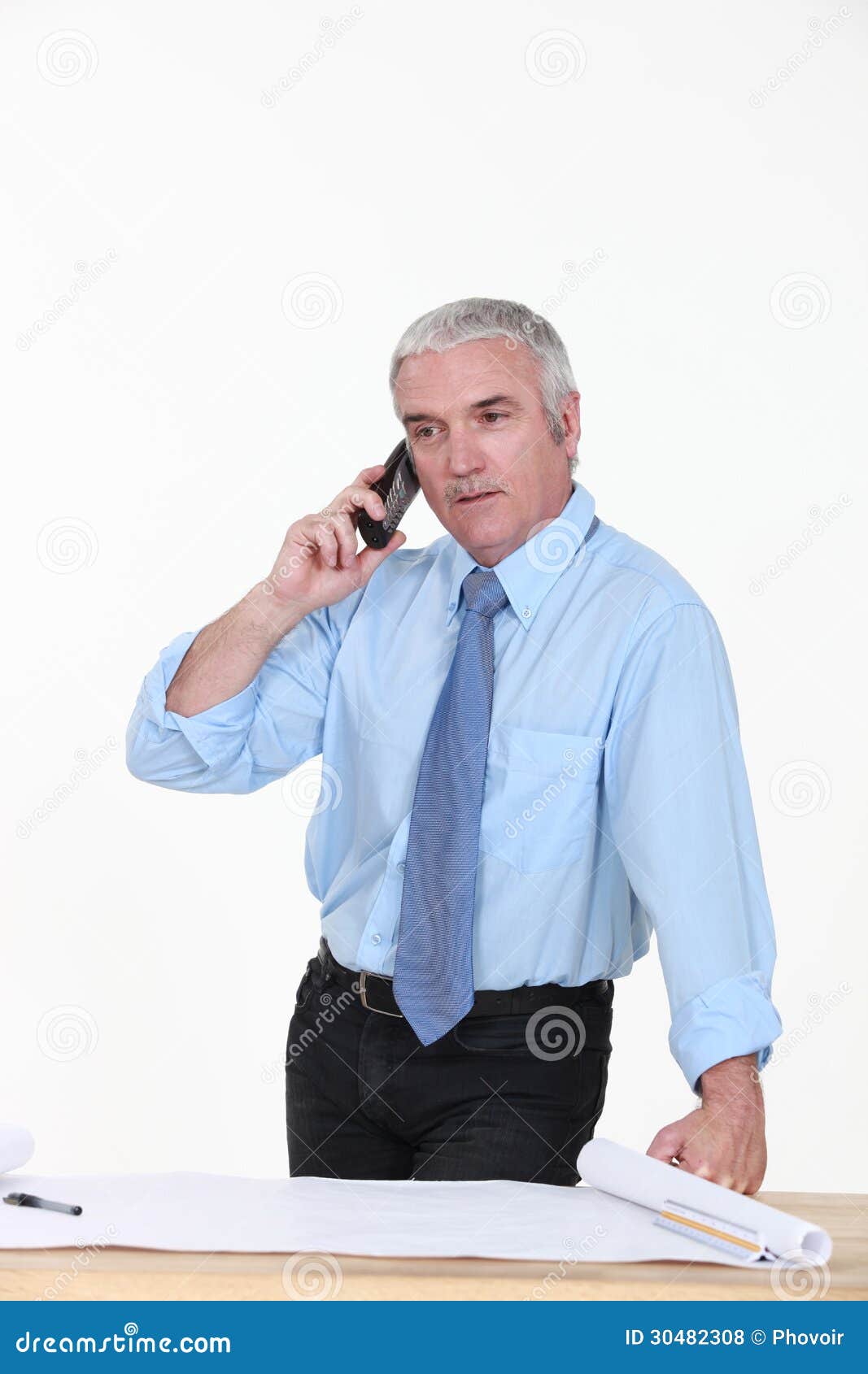 Architect Taking a Telephone Call Stock Photo - Image of plan ...