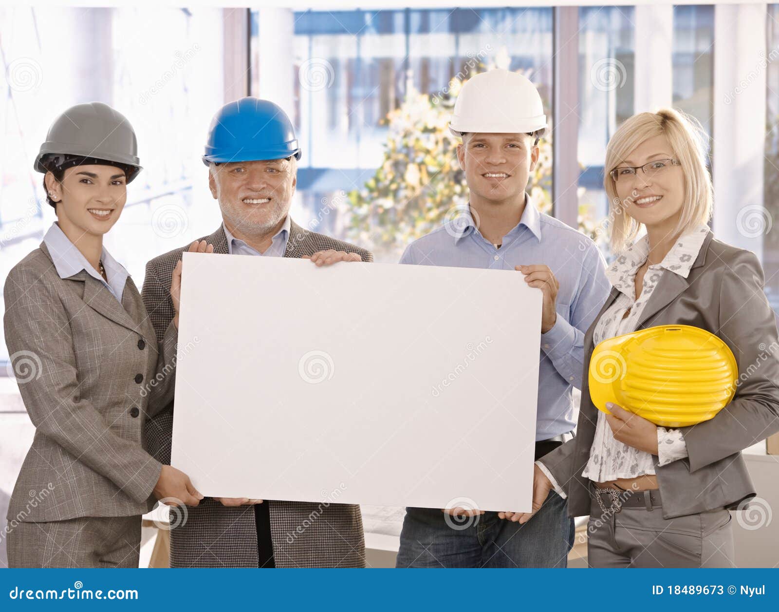 Architect Team Holding Poster in Office Stock Image - Image of ...