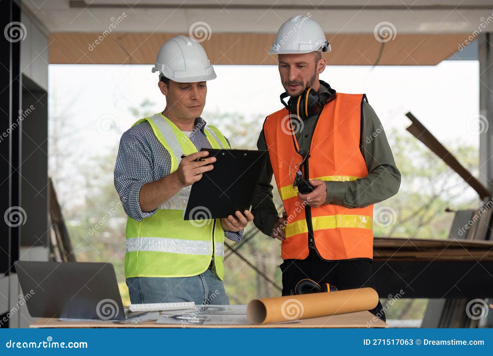 Architect Team Looking at Plan and Talking about Working on Big Project ...