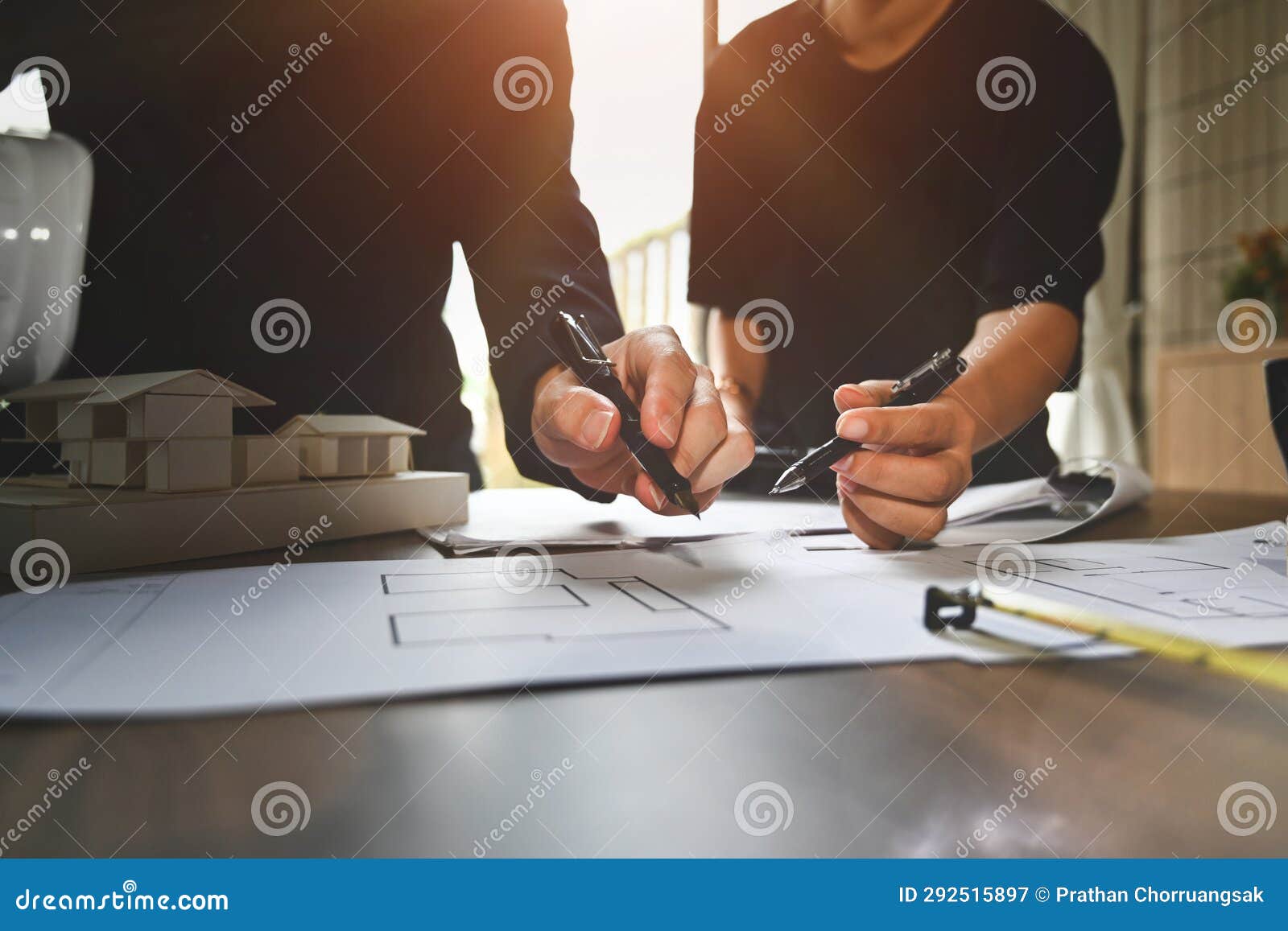 Architect Team Standing at Meeting Table and Working on Construction ...